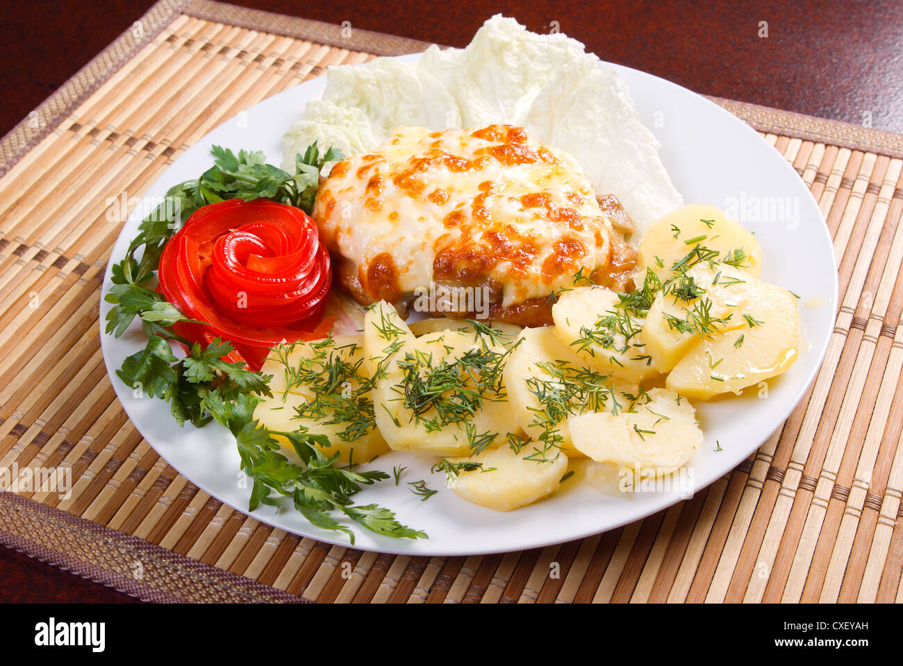 meat with potatoes and vegetable Stock Photo - Alamy