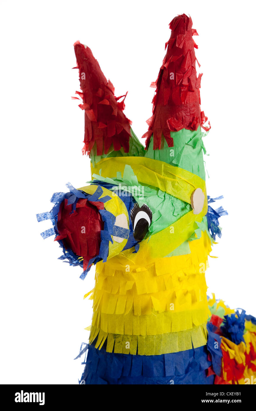 A traditional, primary colored Mexican party piñata on a white ...