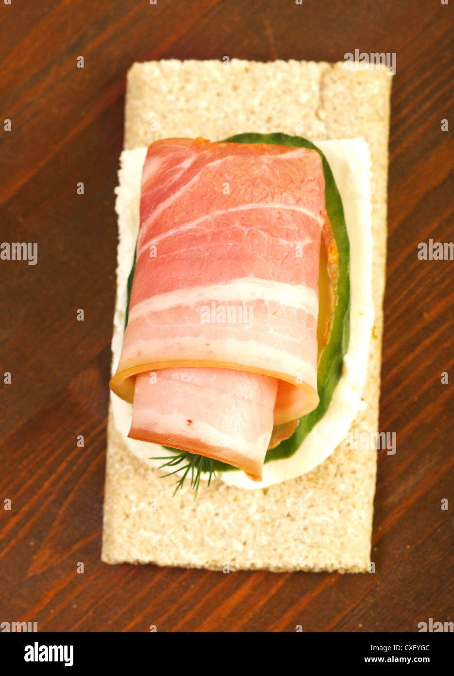 Canapes with smoked bacon Stock Photo - Alamy