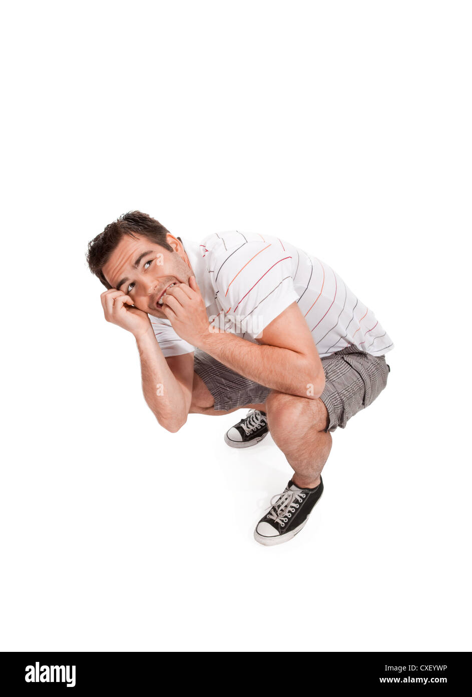 Portrait of young surprised man gesturing Stock Photo - Alamy