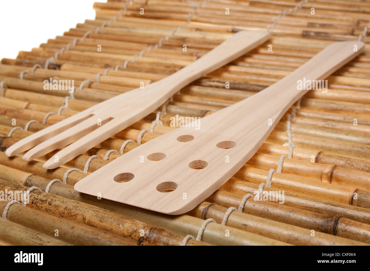 set of three wooden kitchenware Stock Photo - Alamy