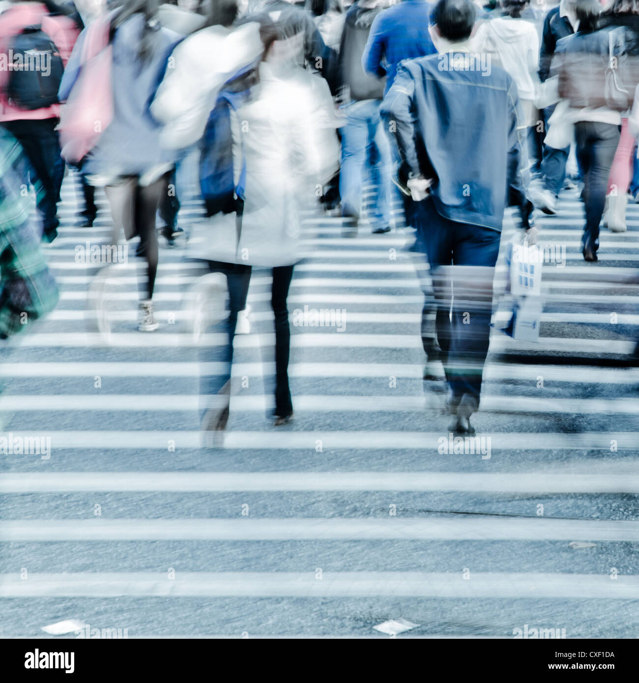 Crowd crossing a zebra crossing hi-res stock photography and images - Alamy
