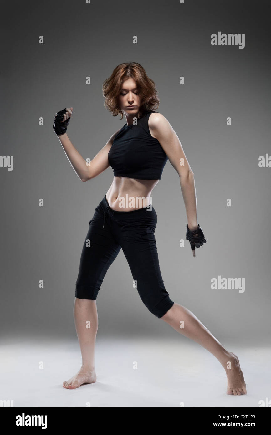 attractive young woman dancing Stock Photo - Alamy