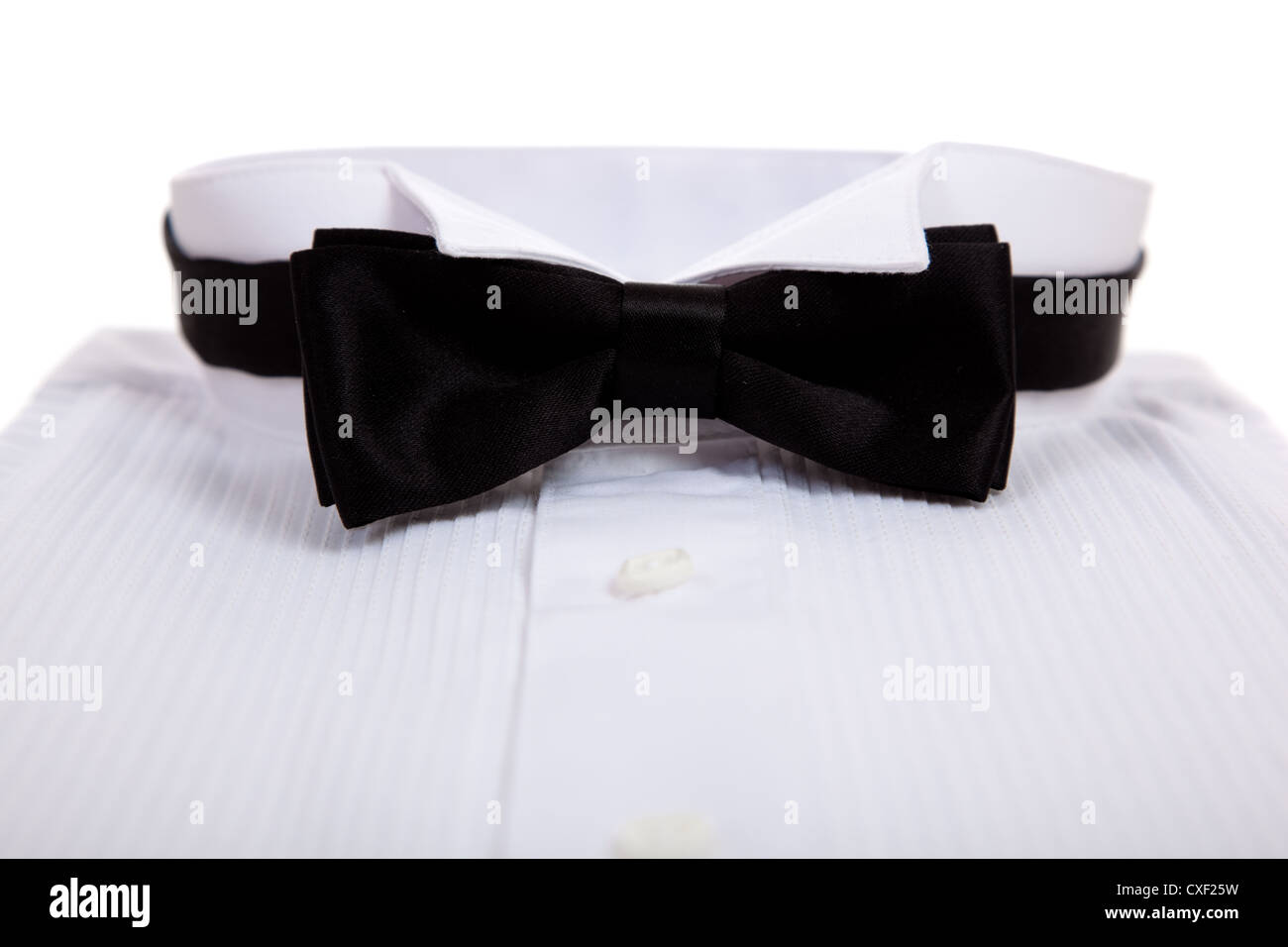 Black suit with white shirt and black bow tie hi-res stock photography ...