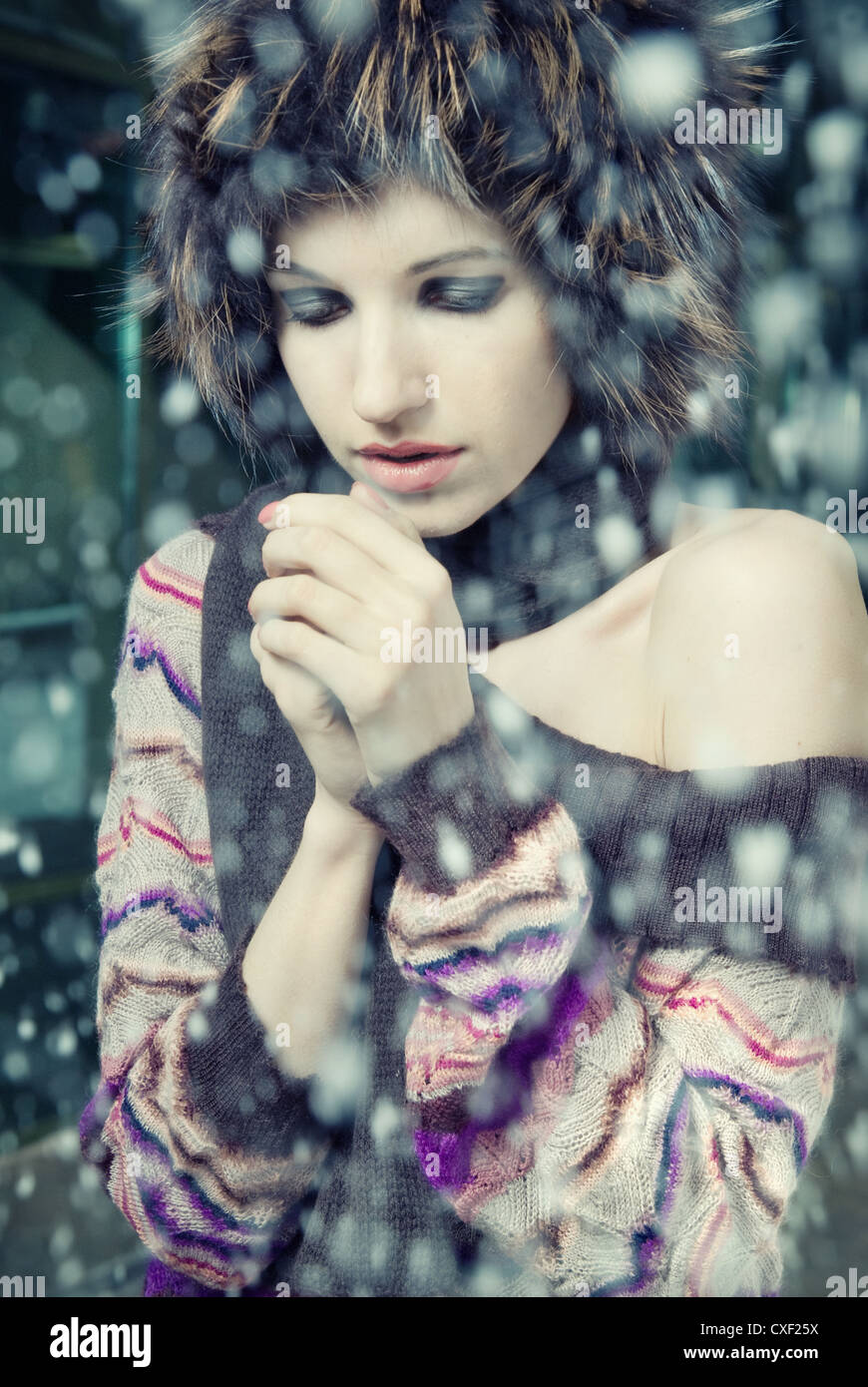 young woman freeze under falling snow Stock Photo - Alamy
