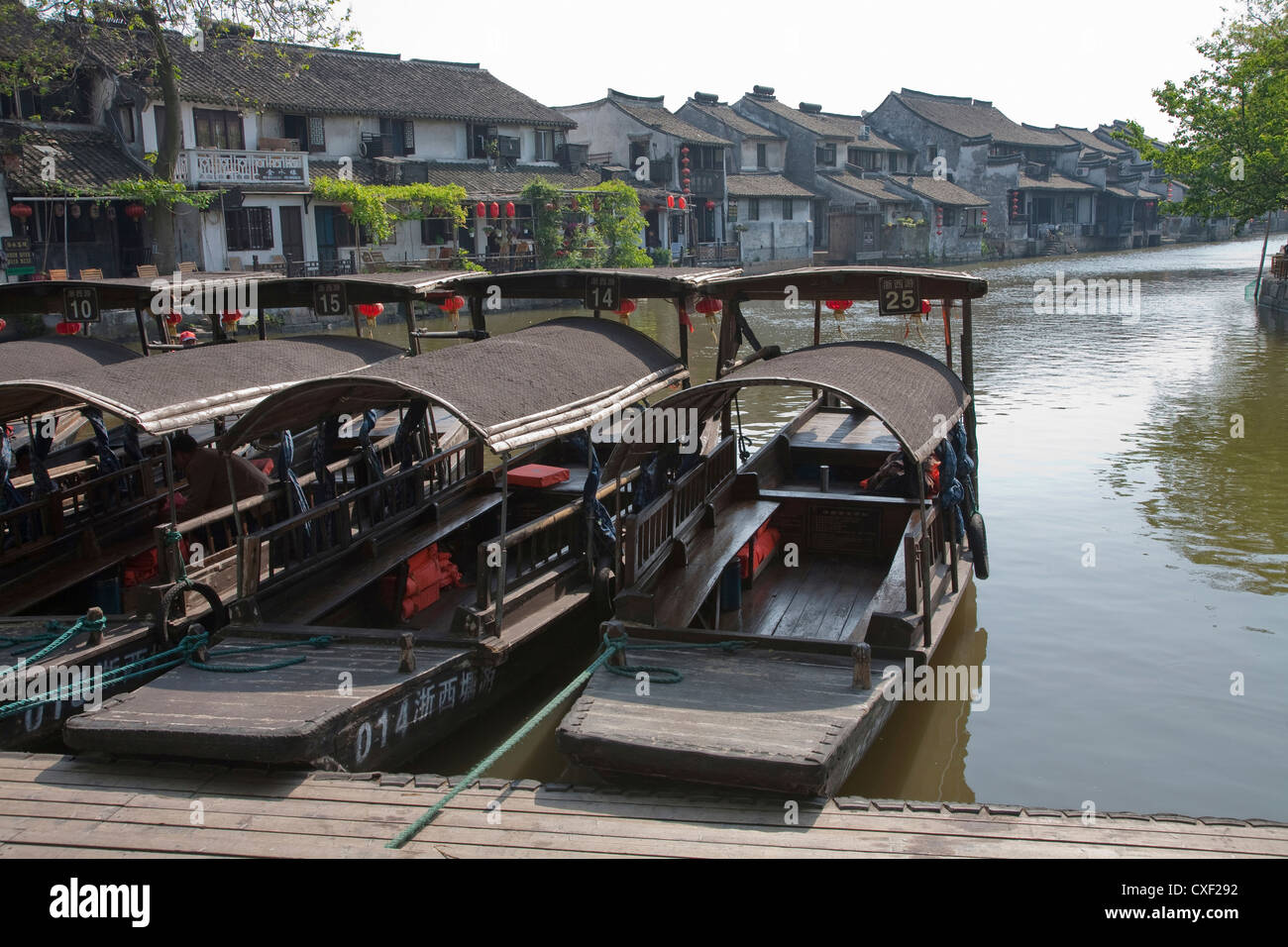 Traditional boat mooring at dock Stock Photo - Alamy