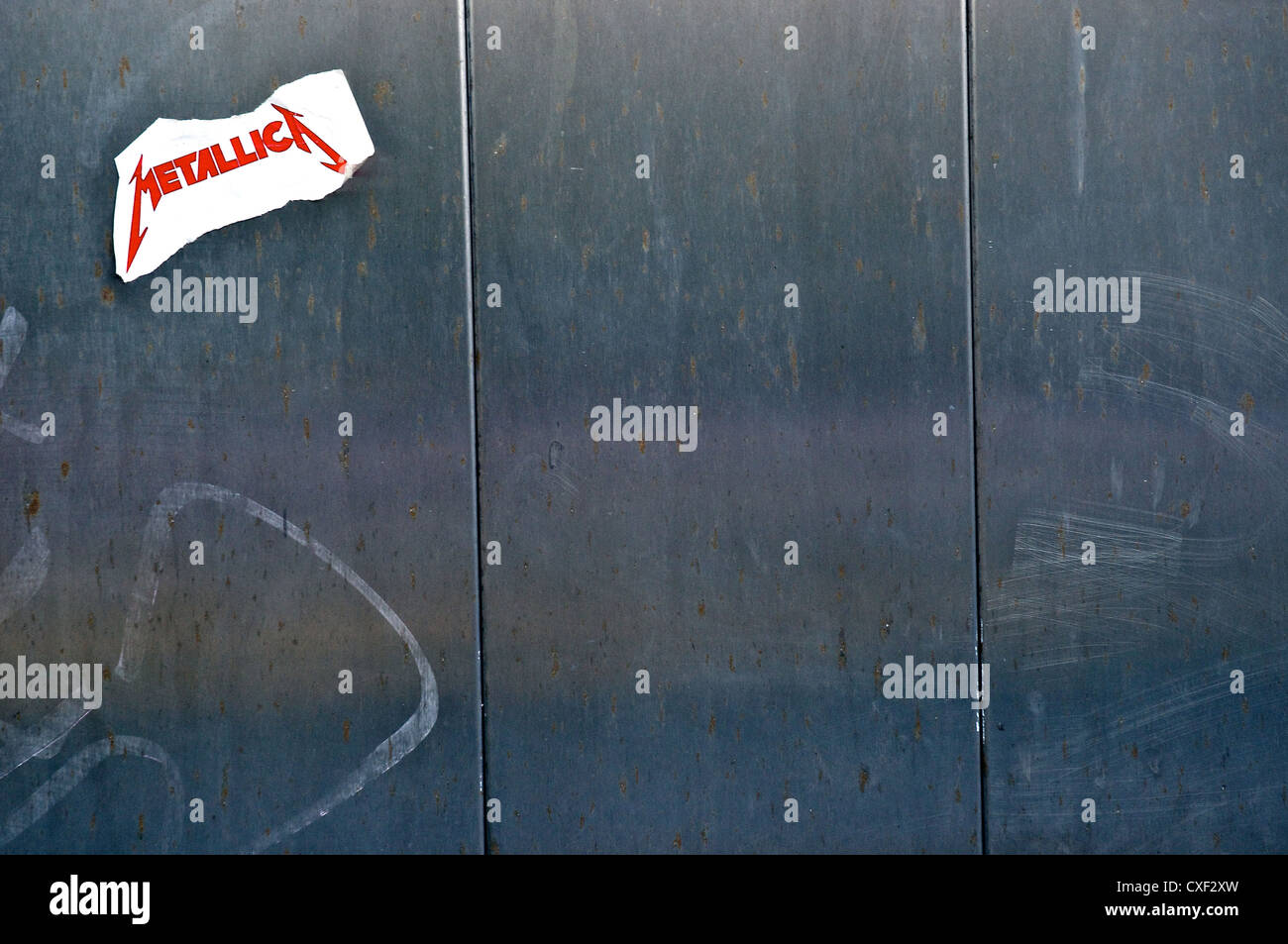 Metallica sticker on a wall Stock Photo - Alamy