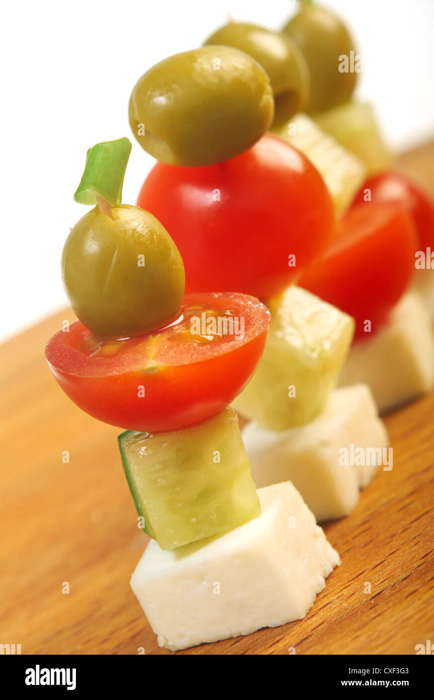 Canape platter with cheese, cucumber,tomato,olives Stock Photo - Alamy