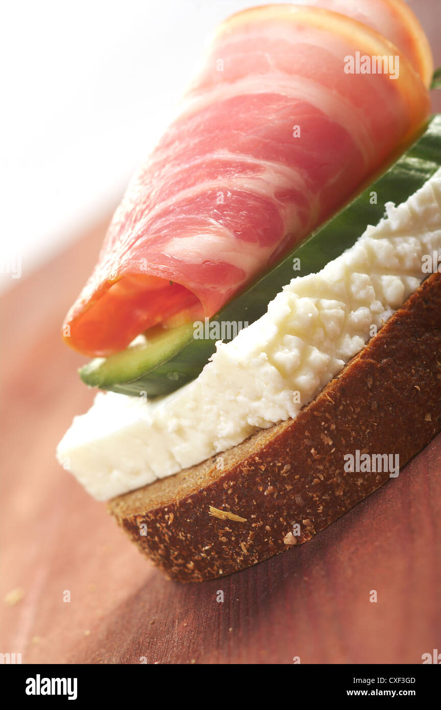 Canapes with smoked bacon Stock Photo - Alamy