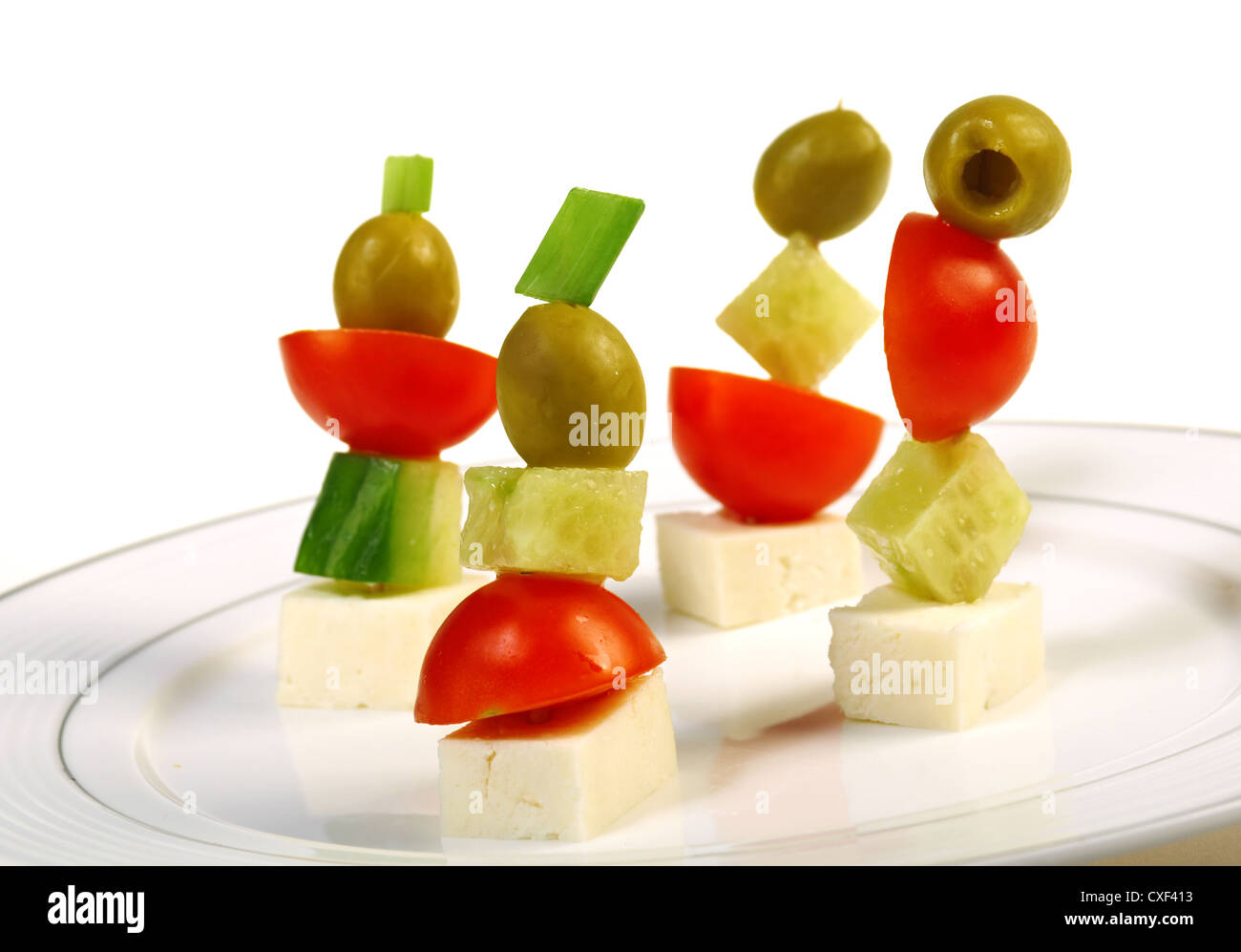Canape platter with cheese, cucumber,tomato,olives Stock Photo - Alamy