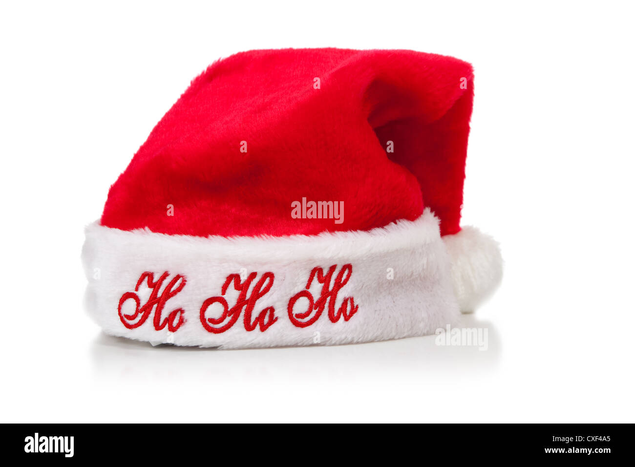 Red and white Christmas Santa hat on a white background Stock Photo - Alamy
