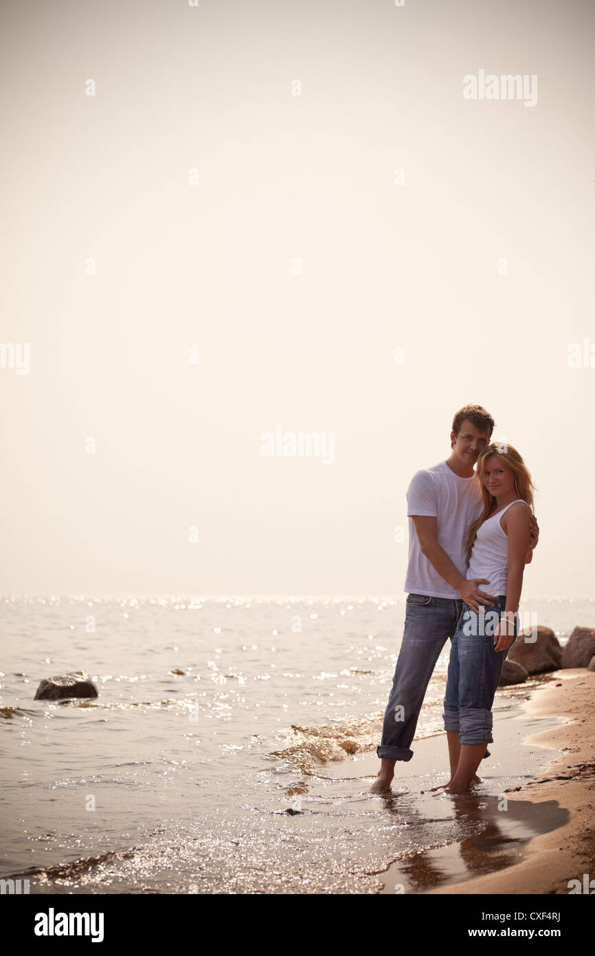 beautiful couple on a seashore Stock Photo - Alamy