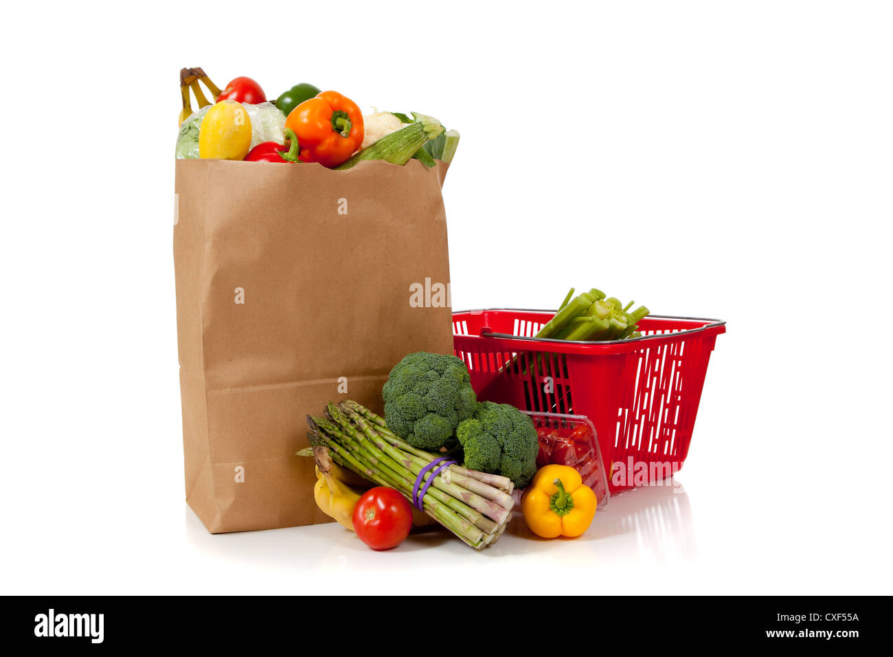 Grocery sack and red basket with fresh vegetables Stock Photo - Alamy