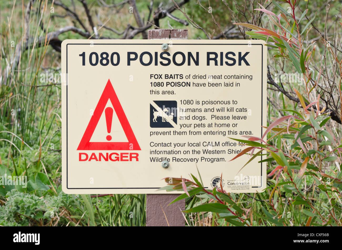 Poison risk sign on the south coast native dune system of Western ...
