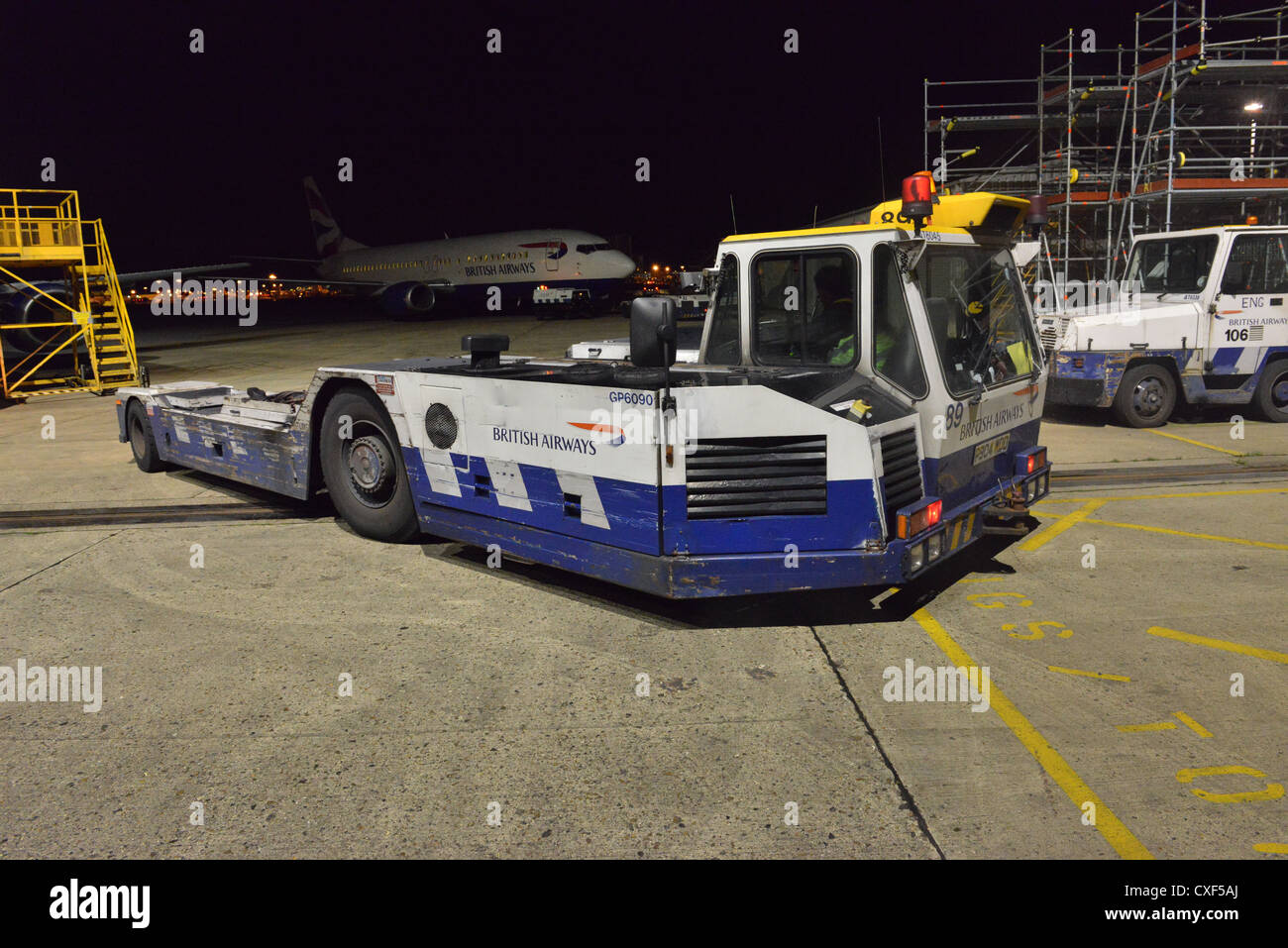 A Douglas TBL 180 towbar less tractor at Gatwick Airport Stock Photo ...