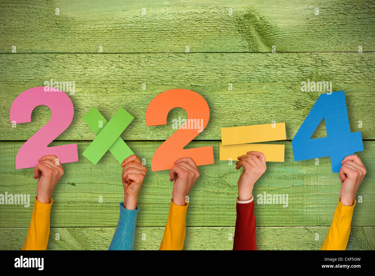 Education concept. Hands showing simple mathematical formula Stock ...