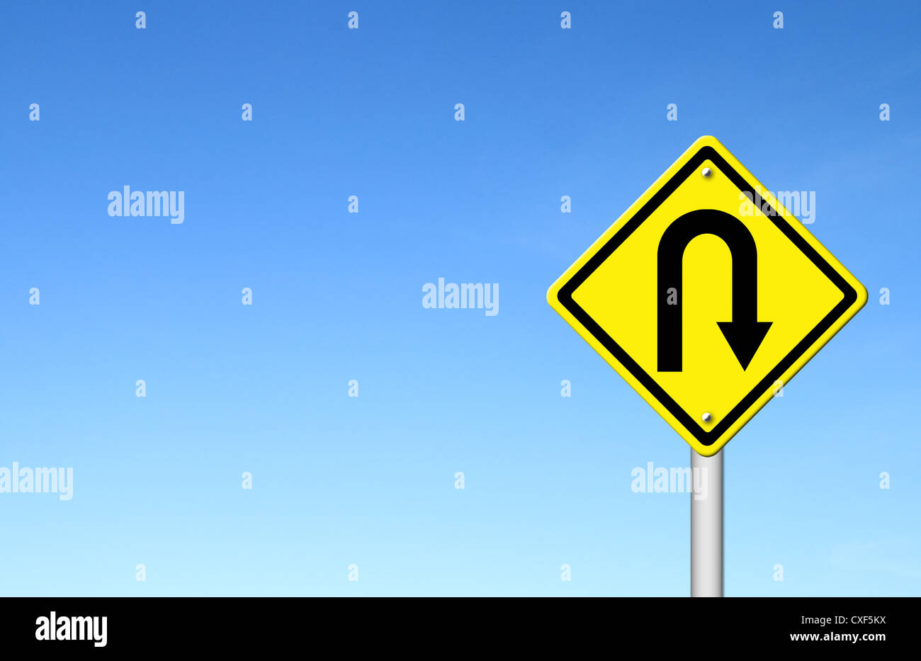 Yellow warning sign u-turn roadsign with blue sky background blank for ...