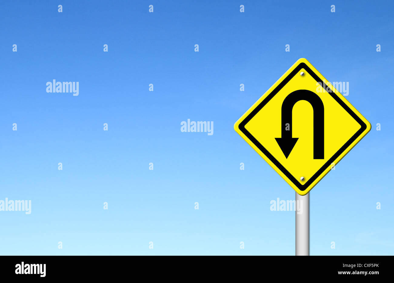 Yellow warning sign u-turn roadsign with blue sky background blank for ...