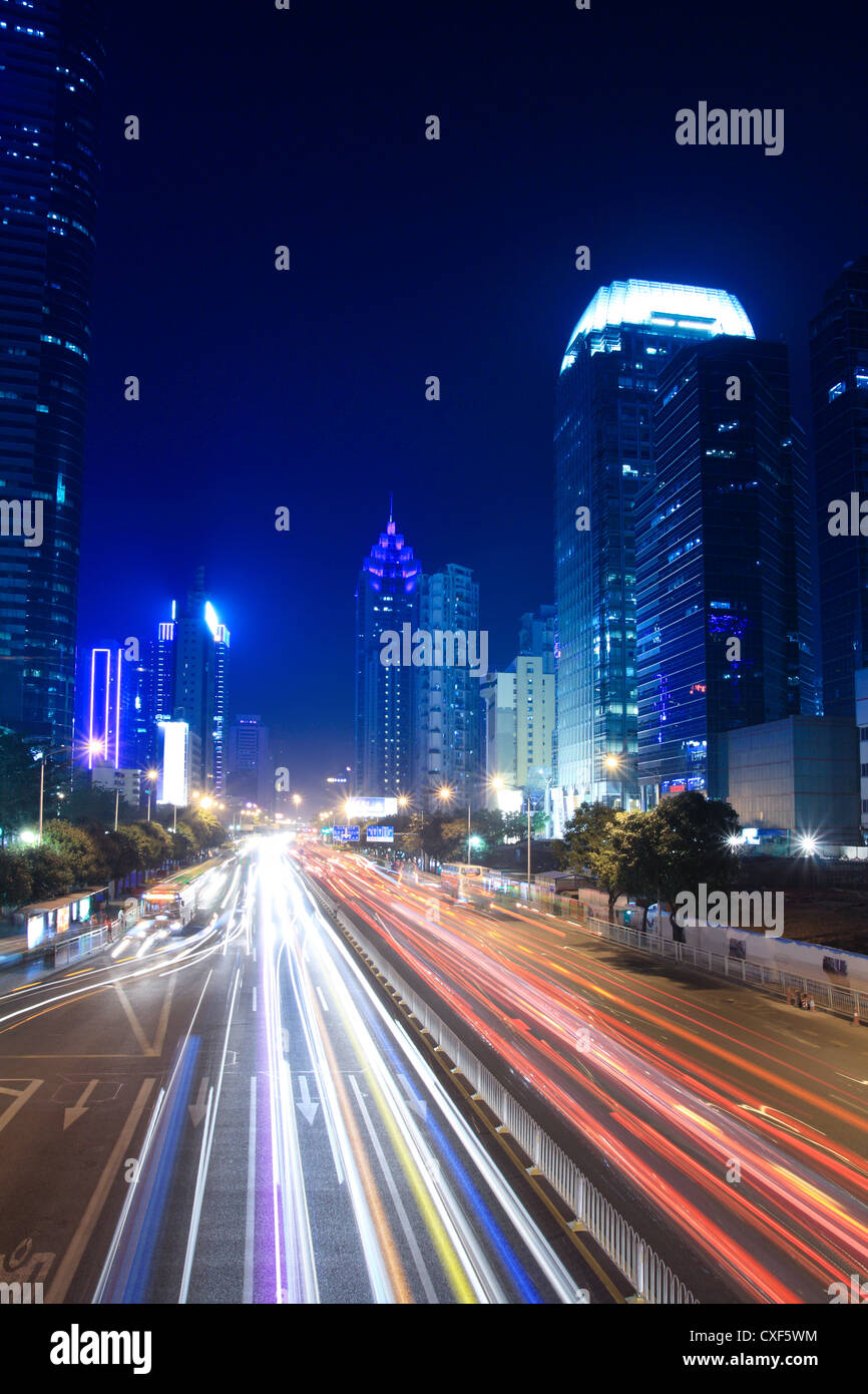 light trails on the street with building background Stock Photo - Alamy