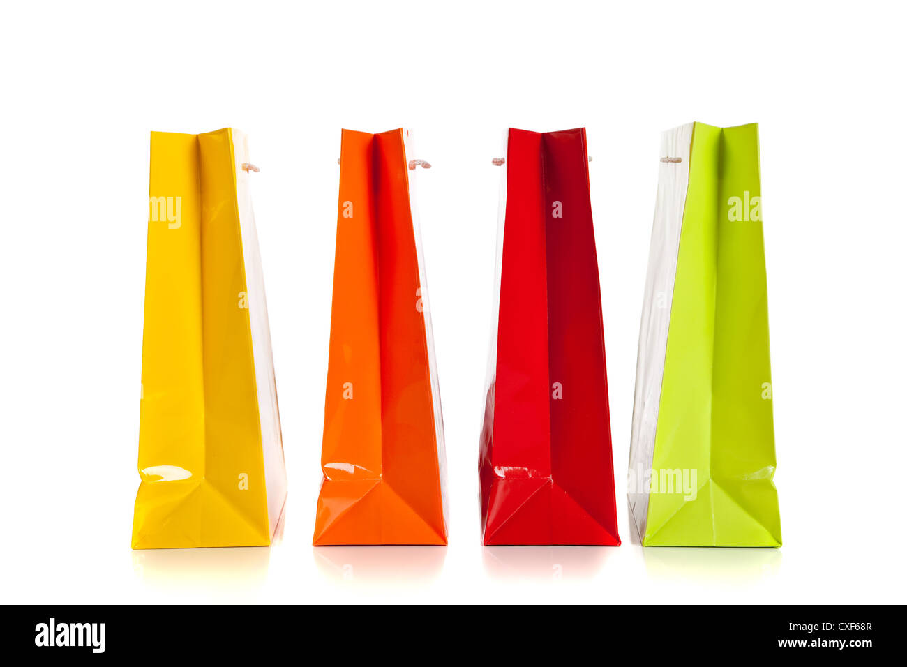 Line of colorful shopping bags on a white background Stock Photo - Alamy