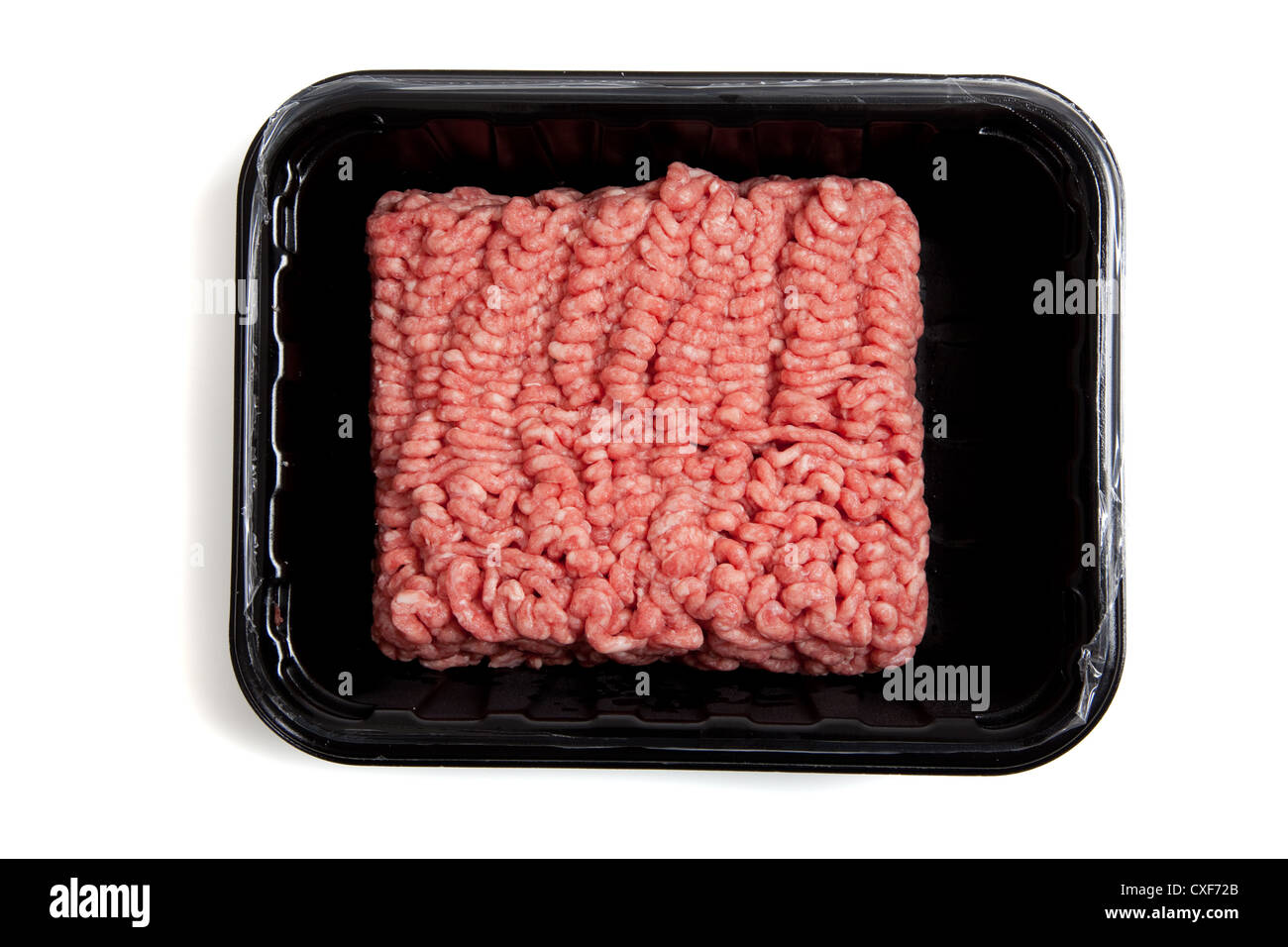 Raw hamburger meat in a black container Stock Photo - Alamy