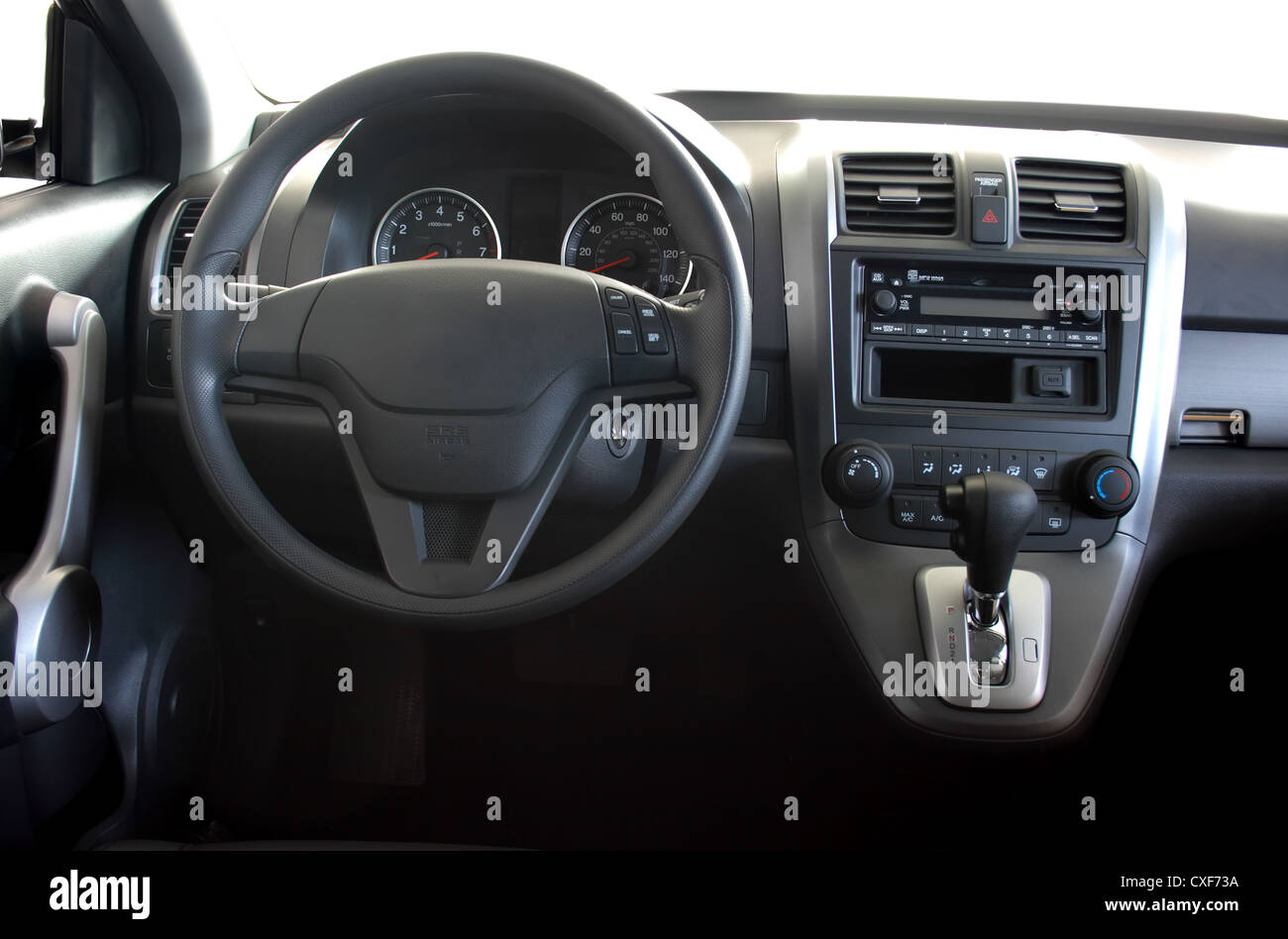 Interior of a car with view on steering wheel and dashboard Stock Photo ...