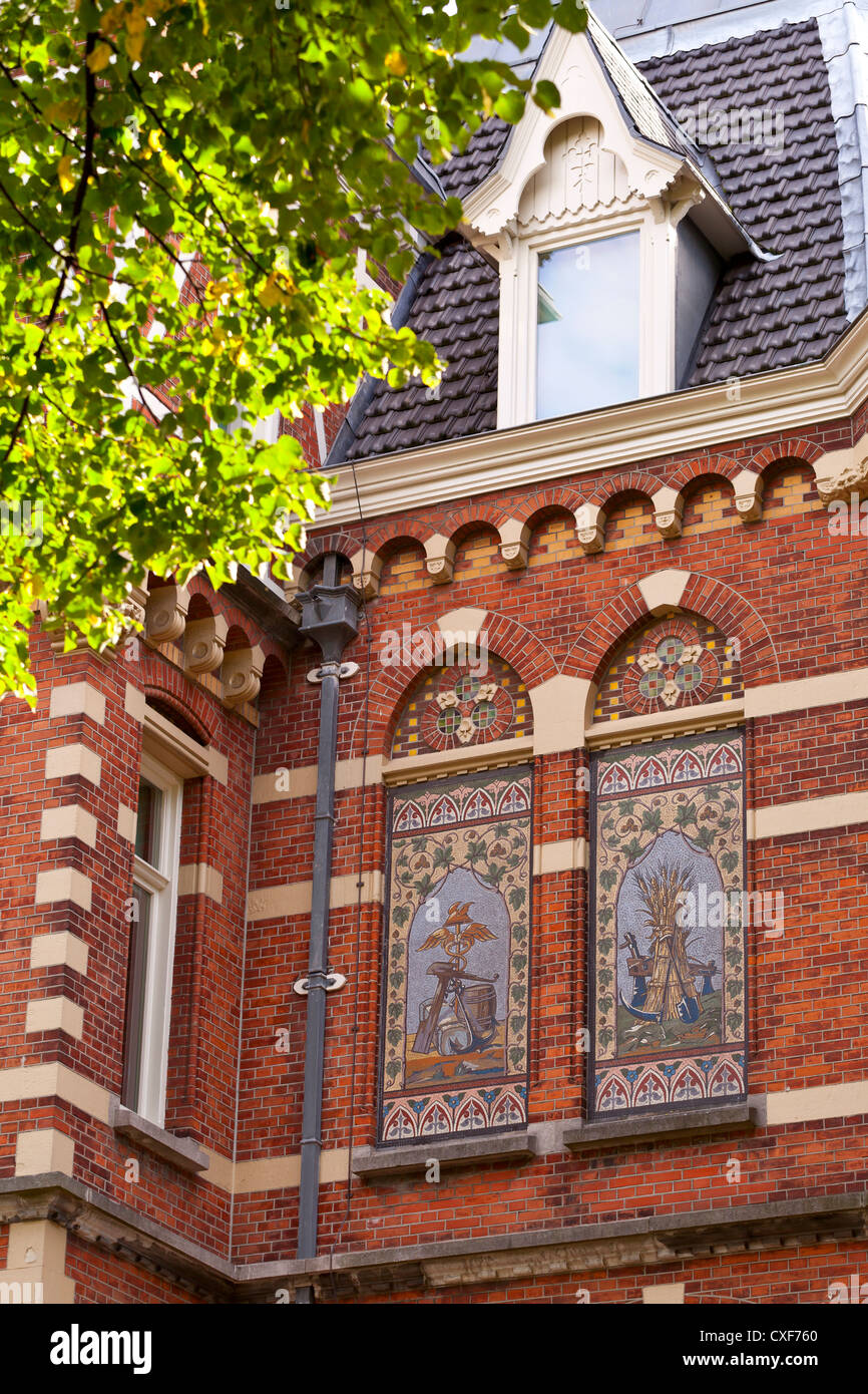 Amsterdam: Decorated historical windows at typical building ...