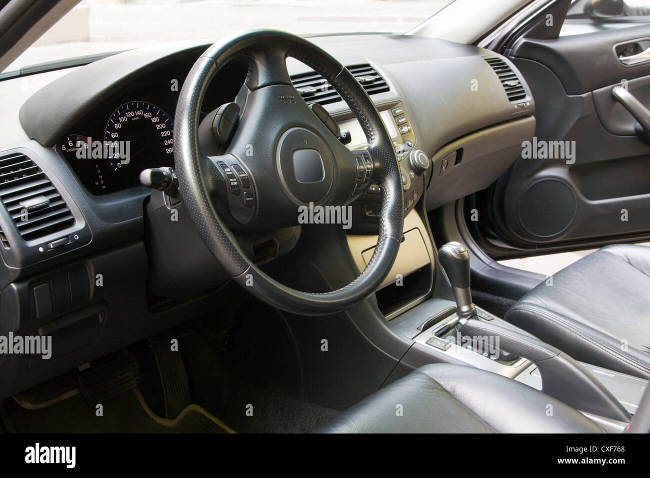 Interior of a car with view on steering wheel and dashboard Stock Photo ...