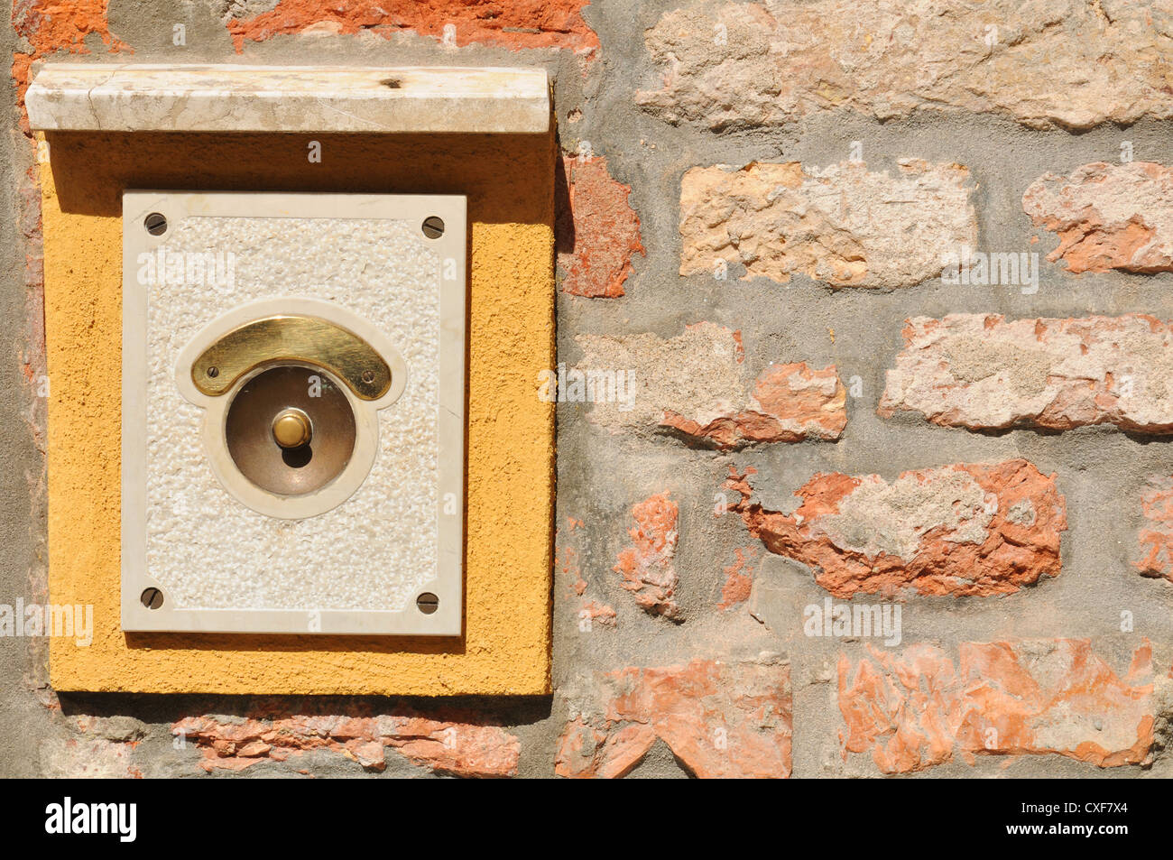Retro ring bell against weathered wall in Venice, Italy Stock Photo - Alamy