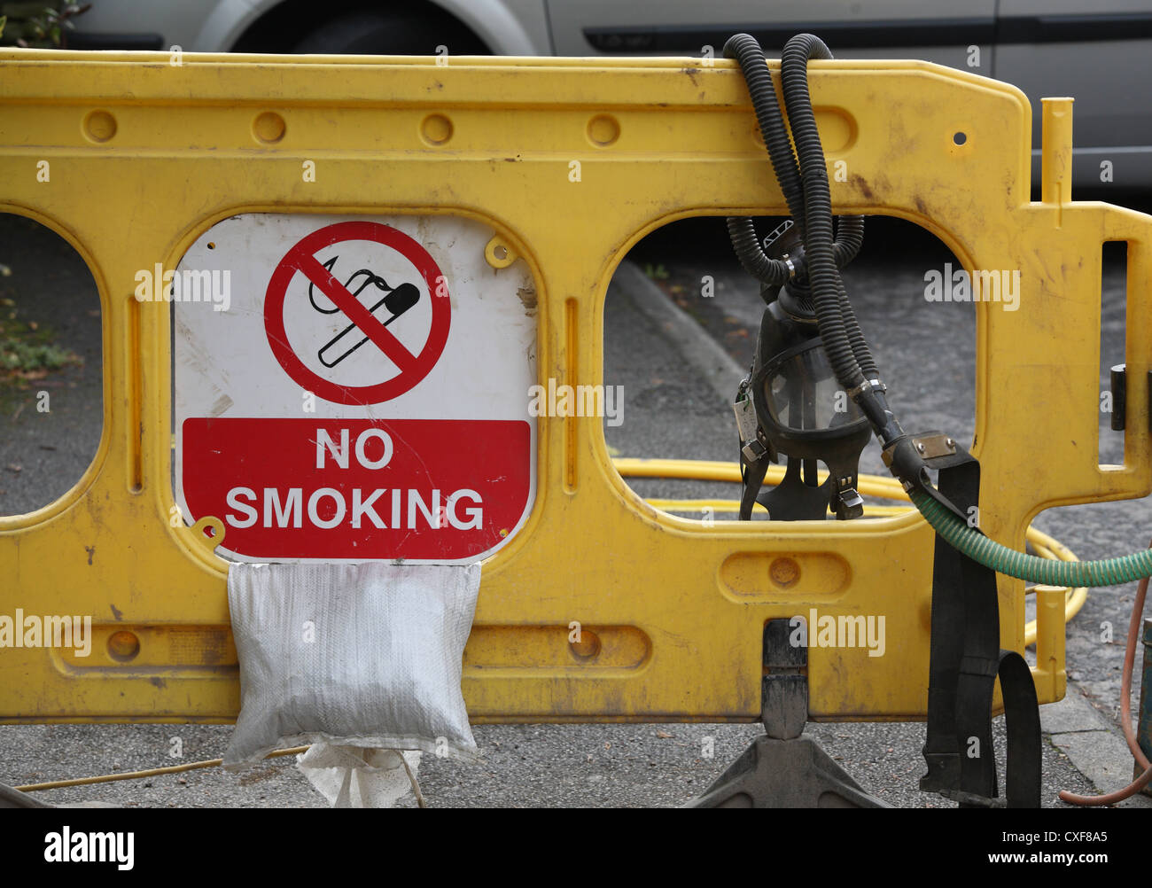 Gas mask and no smoking sign put up during upgrades to residential gas ...