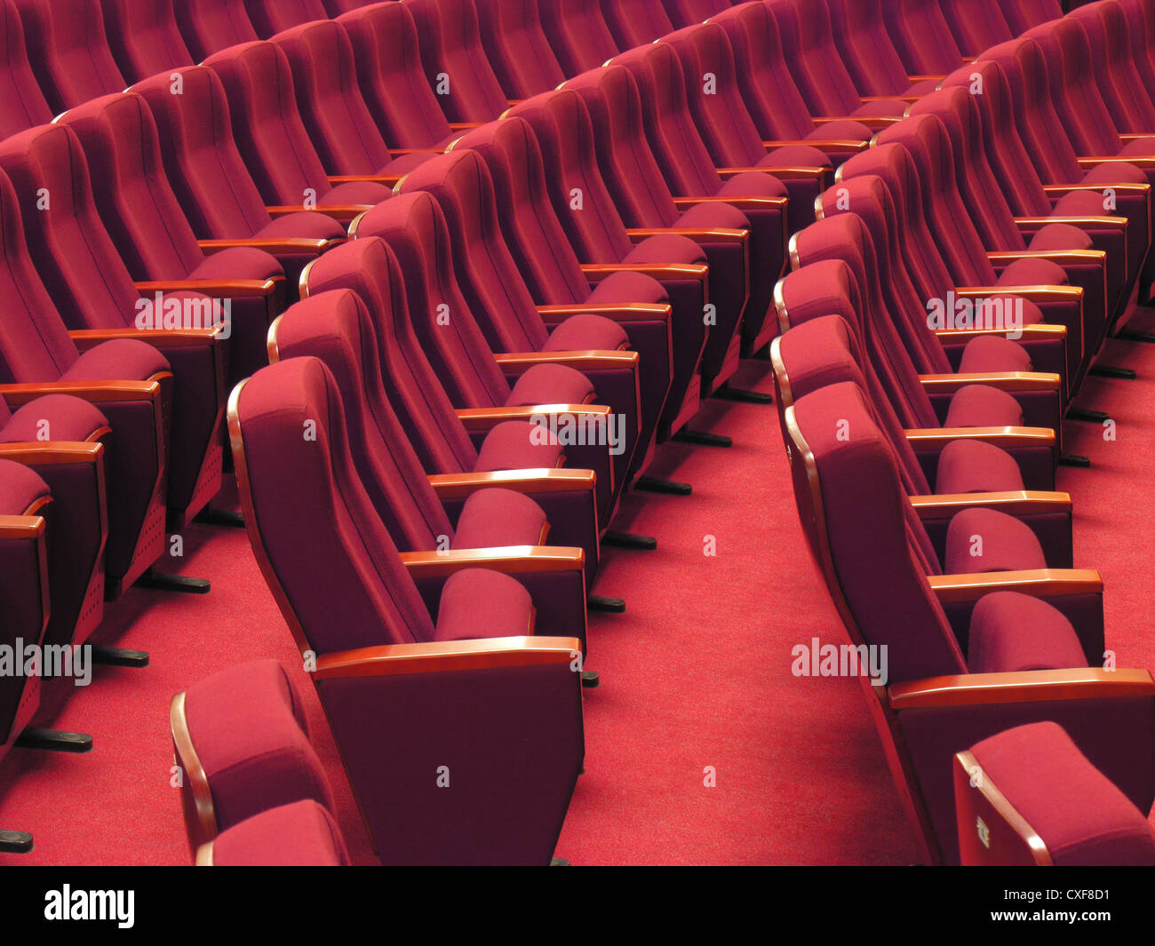 red chairs in the hall Stock Photo - Alamy
