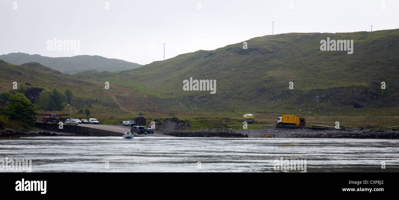 Pedestrian passenger ferry setting off from Luing to Cuan Ferry across ...