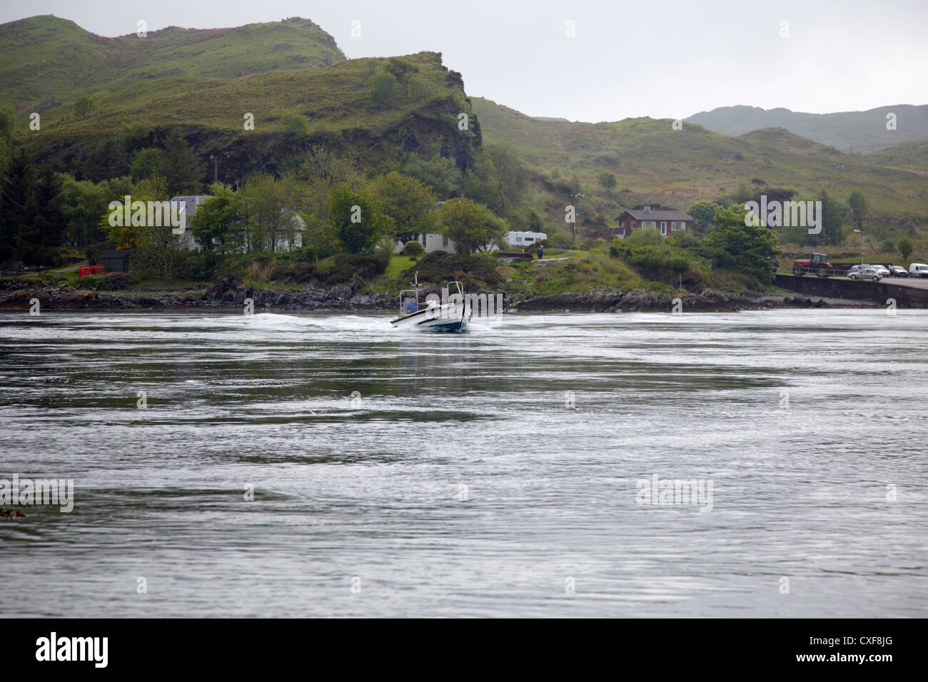 Pedestrian passenger ferry setting off from Luing to Cuan Ferry across ...