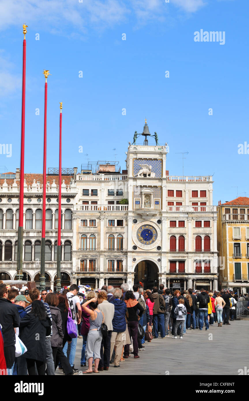 Venice, Italy - 6 May, 2012: Tourists visiting the St. Marc Clock Tower ...