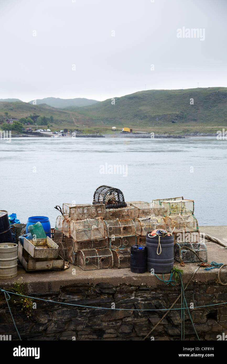 Lobster pots or Creels on the jetty at Cuan Ferry. Argyll Stock Photo ...