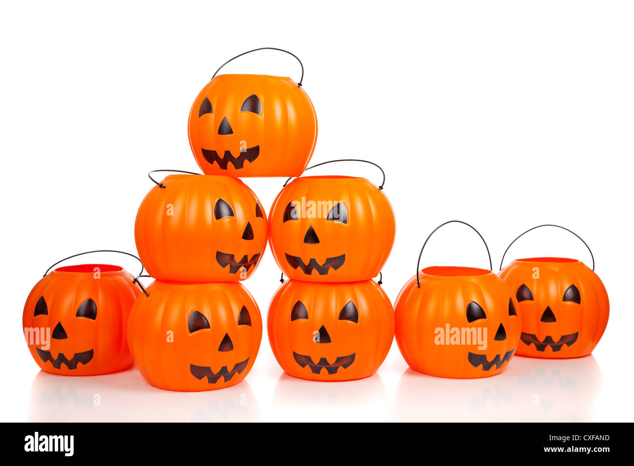 Stack of jack-o-lanterns on a white background Stock Photo - Alamy