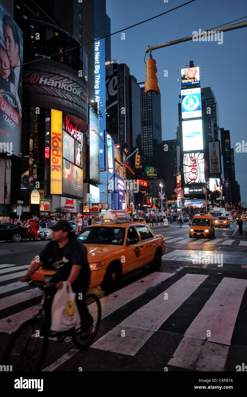 Evening shot of a busy times square in New York Stock Photo - Alamy