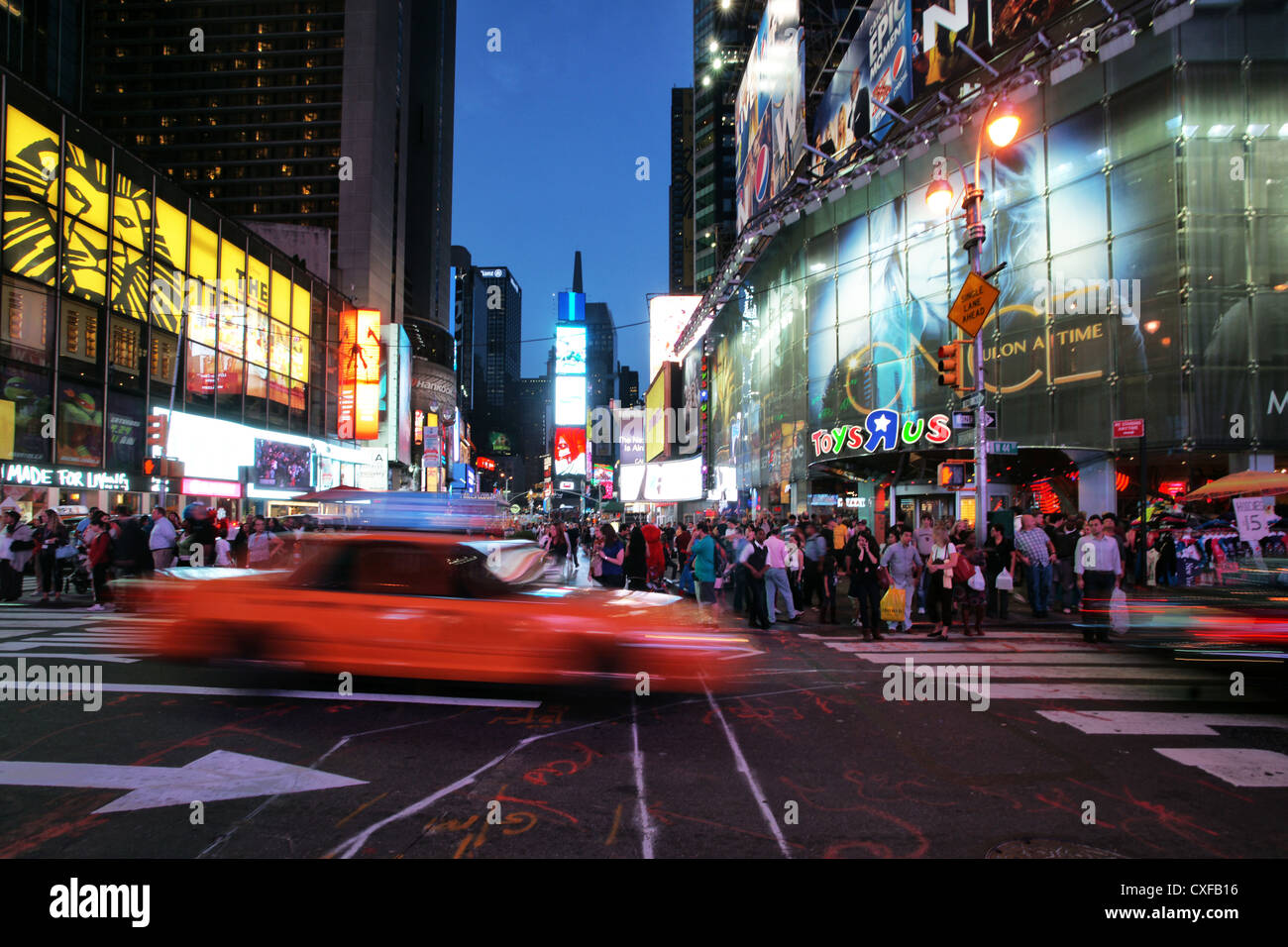 Evening shot of a busy times square in New York Stock Photo - Alamy