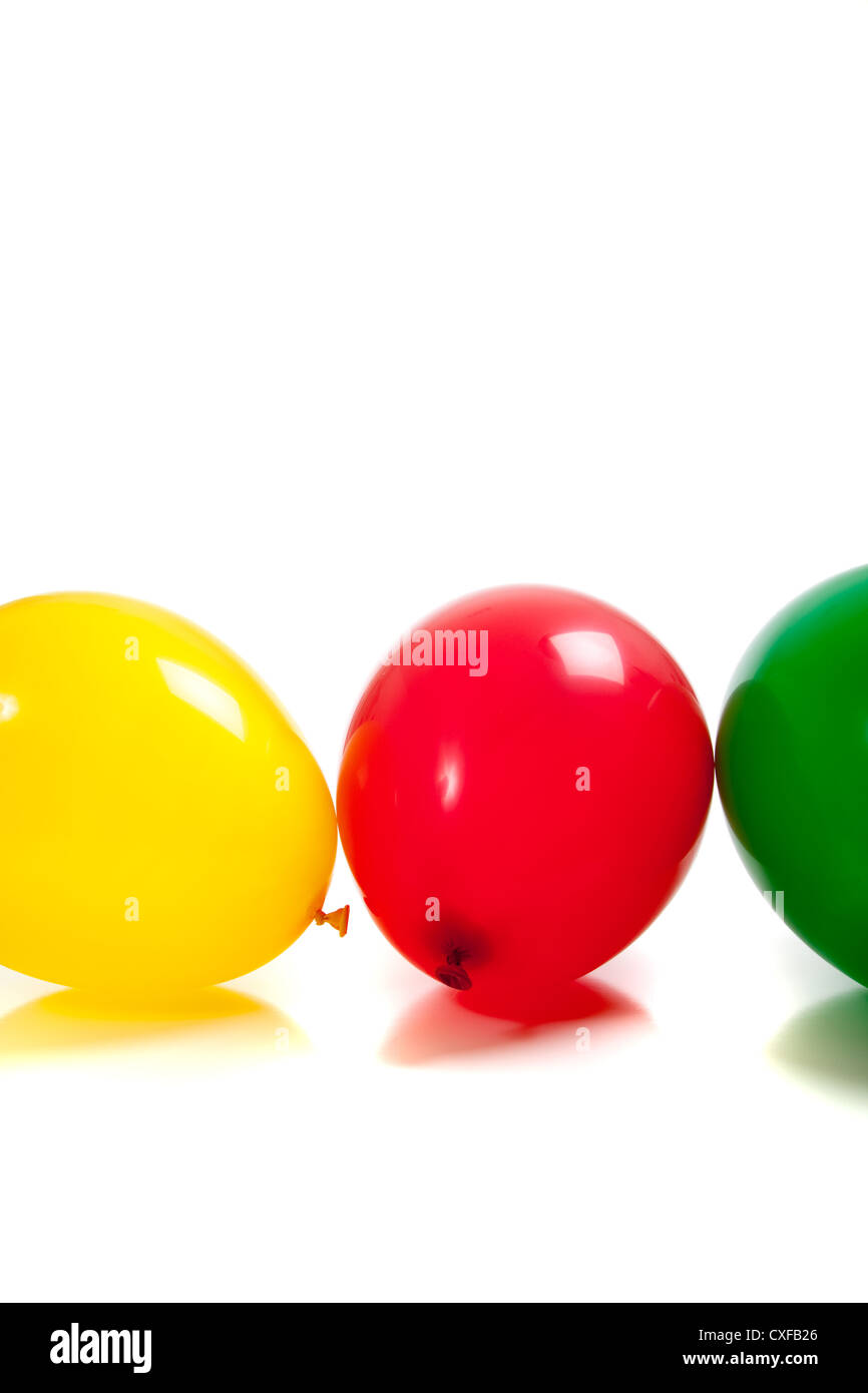 row of colored balloons Stock Photo - Alamy