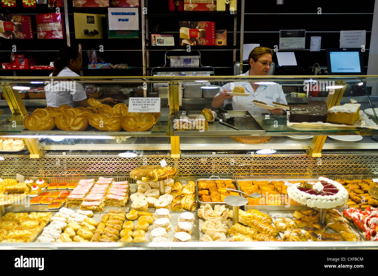 Typical pastry shop in Seville during Holy week celebration, Andalusia ...