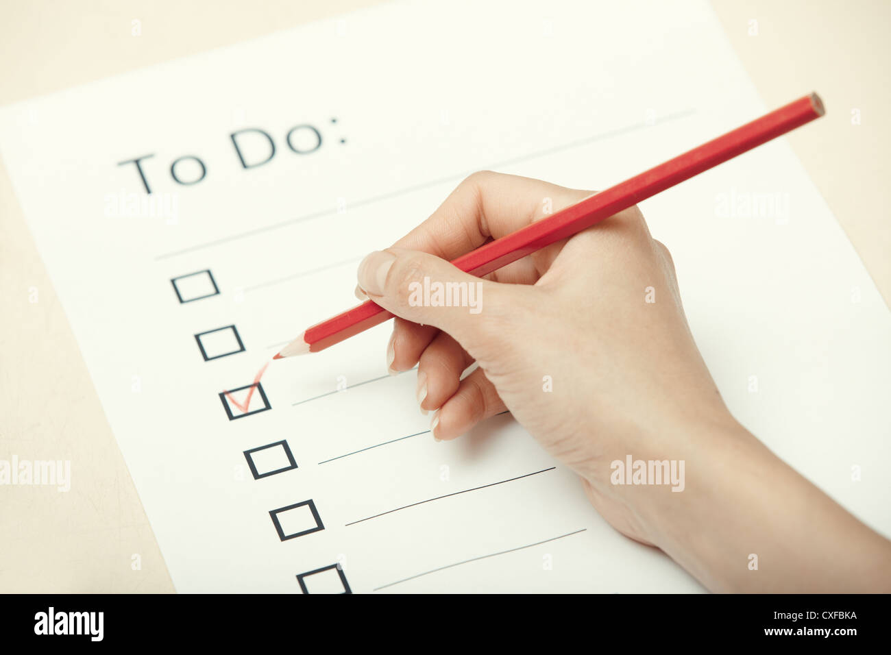 Human hand writing on a checklist document Stock Photo - Alamy