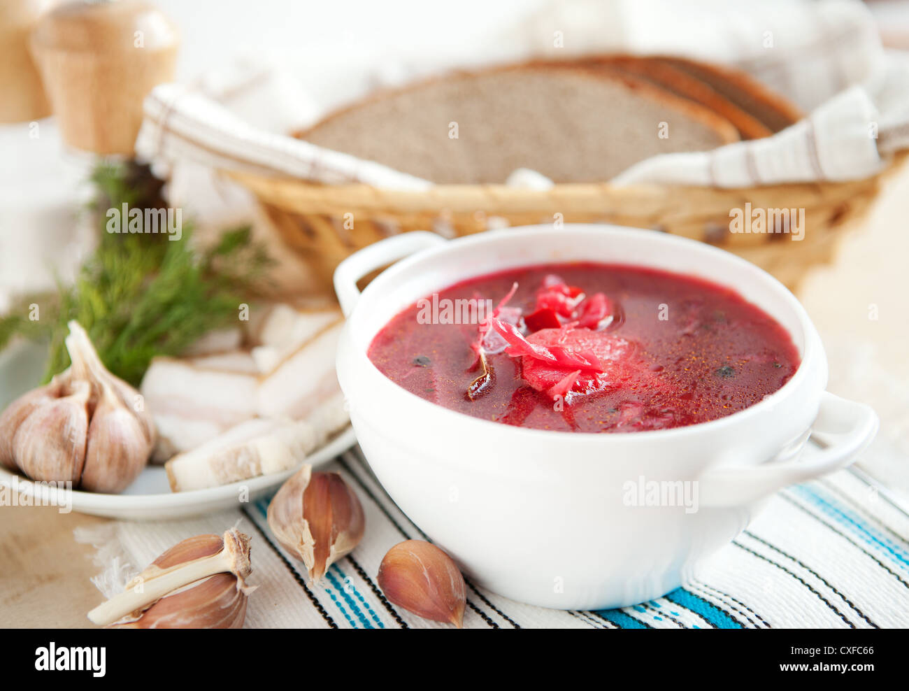 Red borscht without meat in a white bowl. soup Stock Photo - Alamy