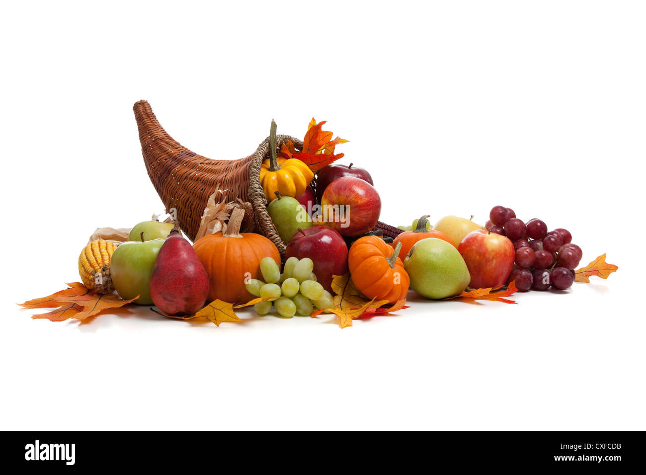 Cornucopia full of fruit and gourds Stock Photo - Alamy
