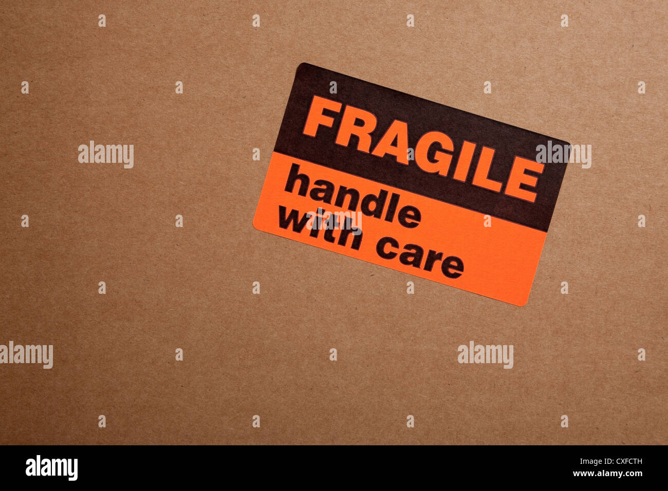 Moving boxes with fragile sticker on a white background Stock Photo - Alamy