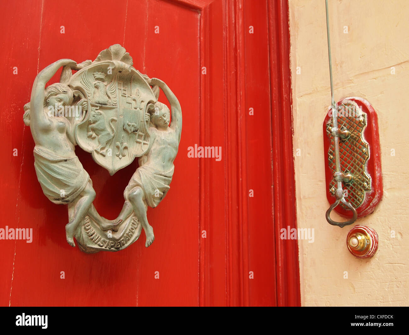 A door knocker and doorbell Stock Photo - Alamy
