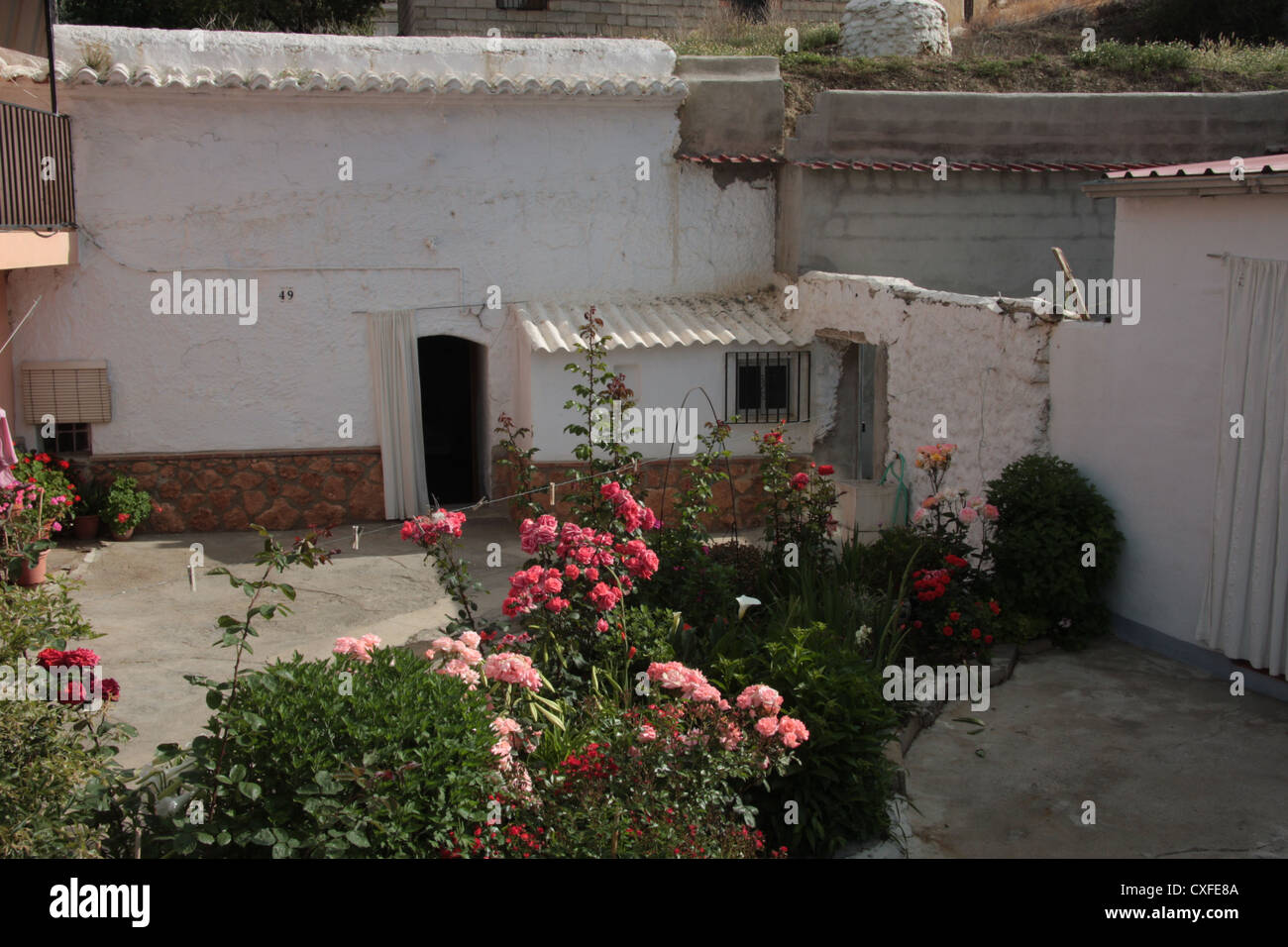 Curtain door to a cave house at Purullena, Spain Stock Photo - Alamy