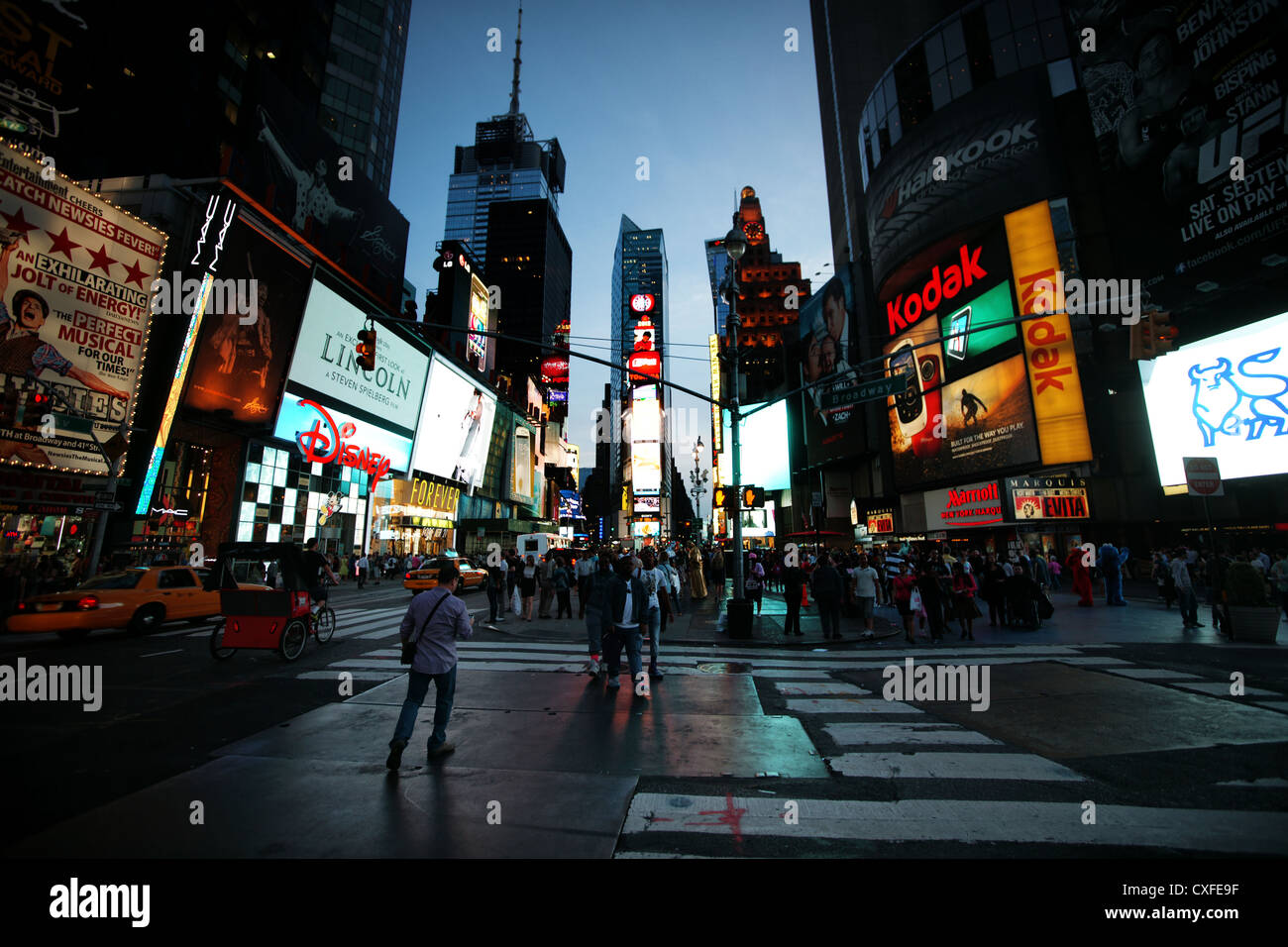 Evening shot of a busy times square in New York Stock Photo - Alamy