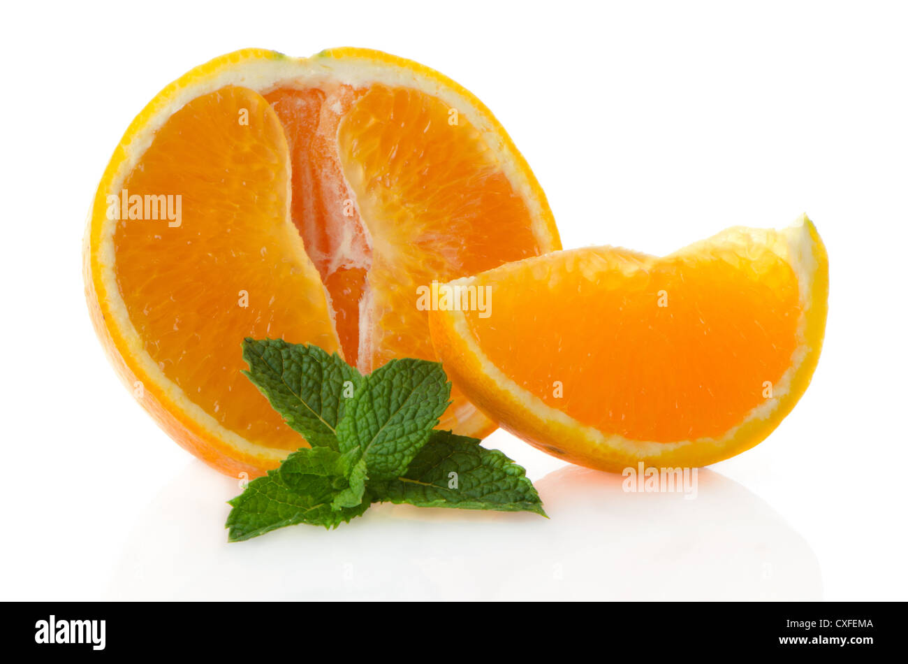 Orange fruit segment and mint leaf on white background Stock Photo - Alamy
