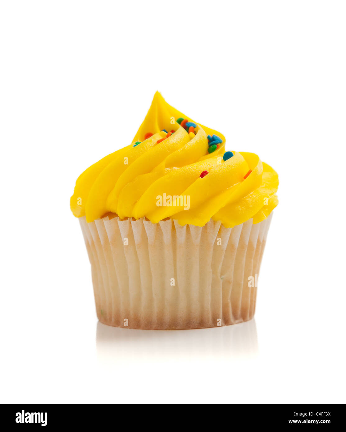 yellow cupcake on a white background Stock Photo - Alamy