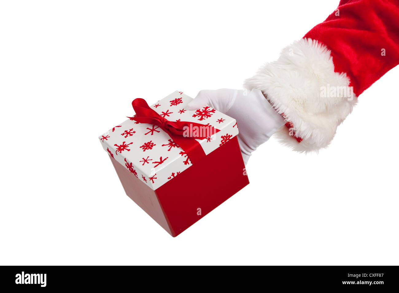 Santa's arm holding out a red and white wrapped Christmas present Stock ...